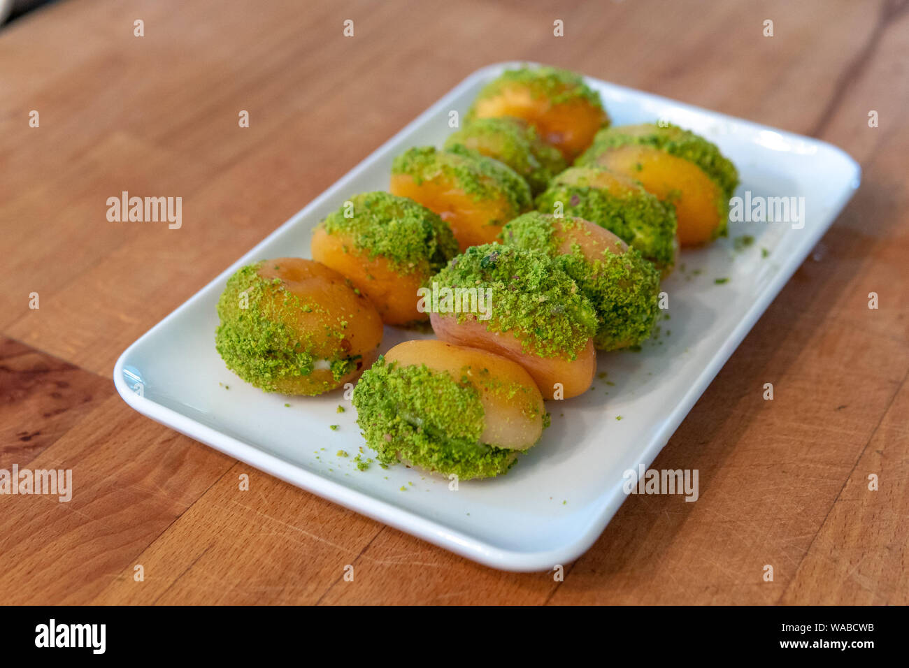 Turkish Apricots stuffed with buffalo cheese and topped with pistachio ...