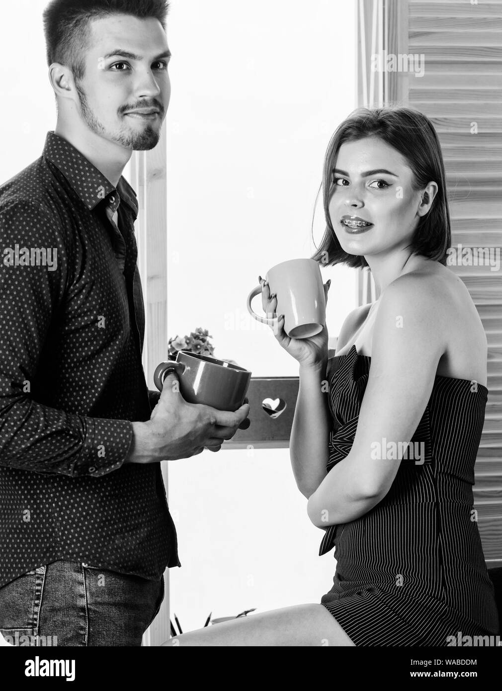 Two men drinking tea Black and White Stock Photos & Images - Alamy