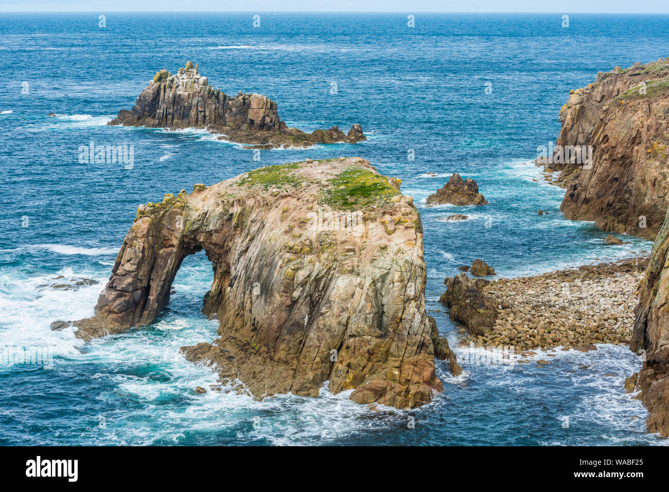Enys Dodnan and the Armed Knight rock formations at Lands End, Cornwall ...