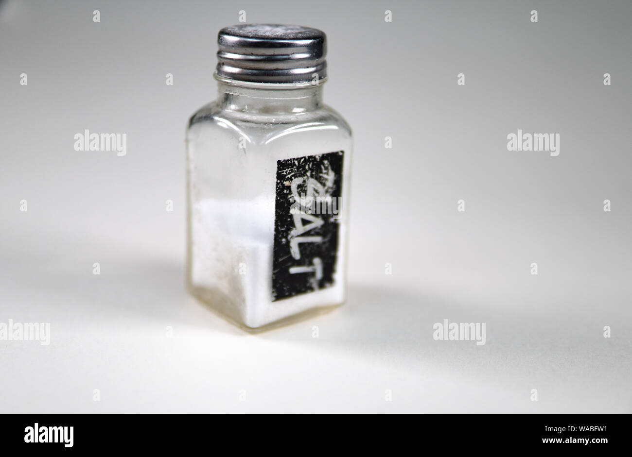 Salt shaker hand hi-res stock photography and images - Alamy