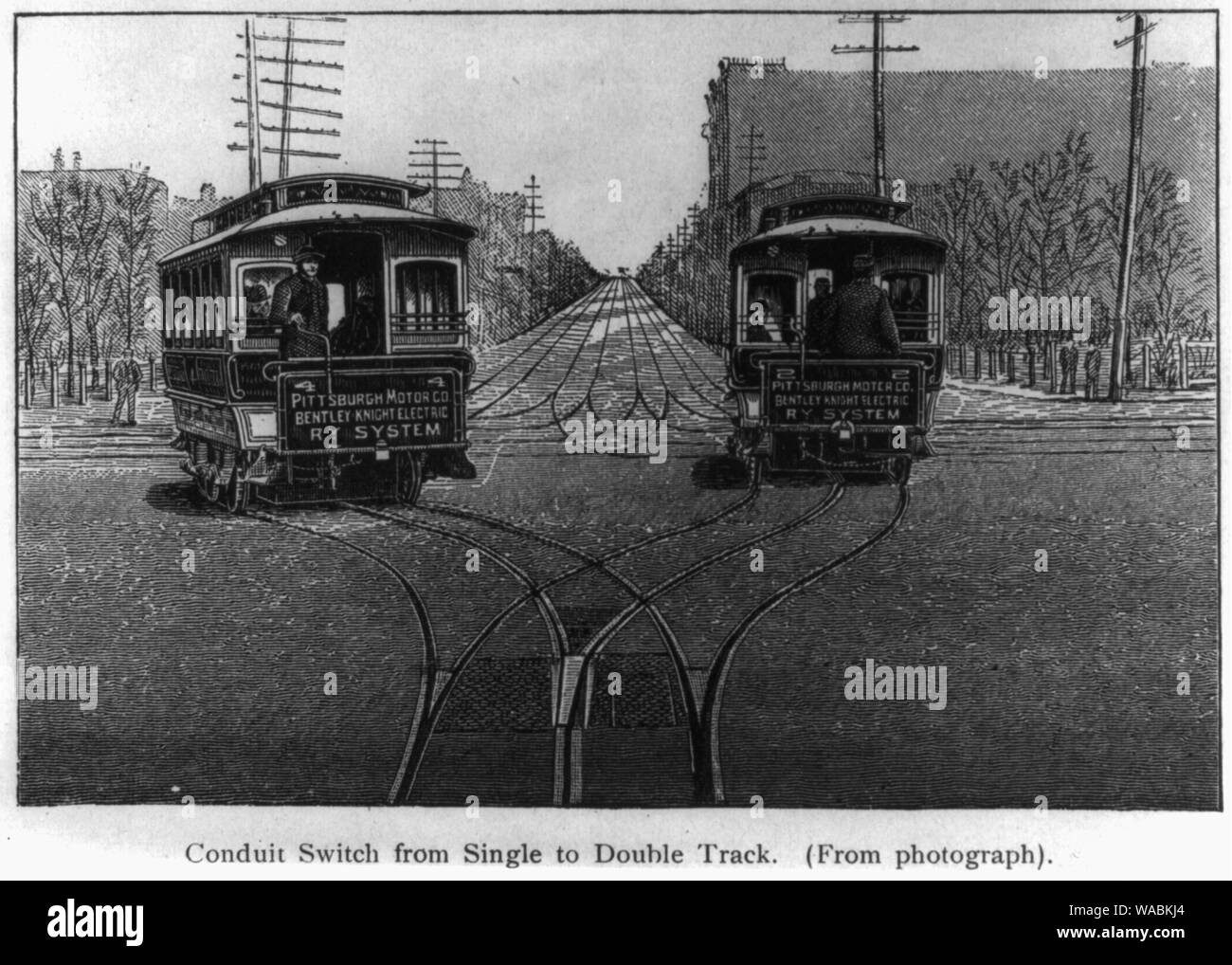 Conduit switch from single to double track Stock Photo - Alamy