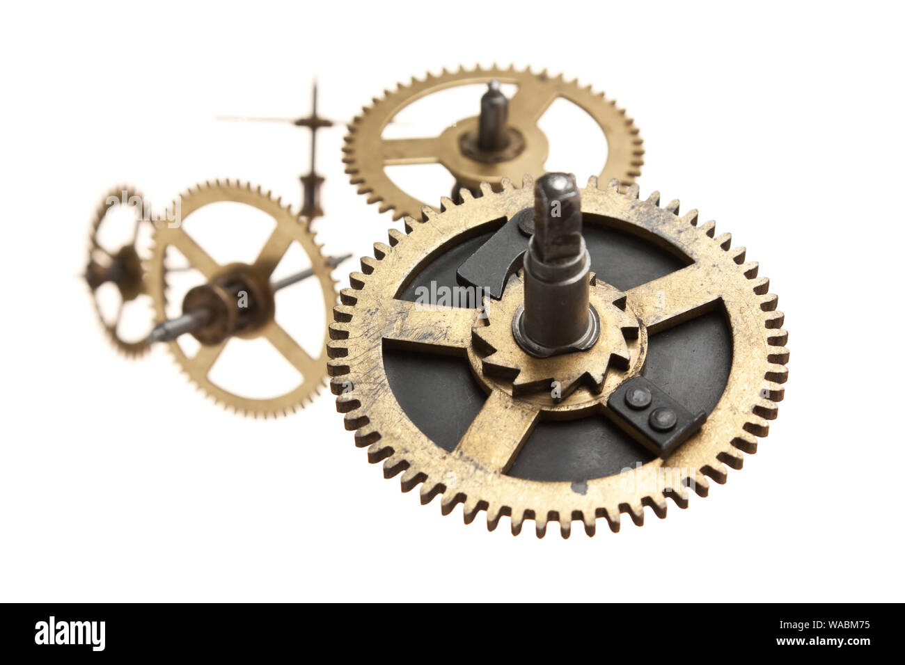 clockwork gears isolated on white background Stock Photo - Alamy