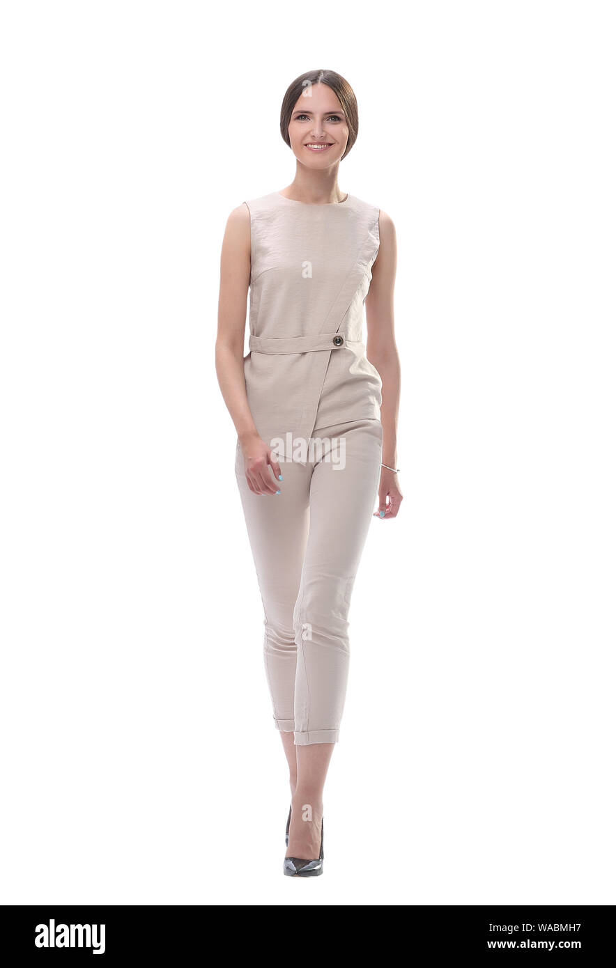 in full growth. modern young woman stepping forward Stock Photo - Alamy