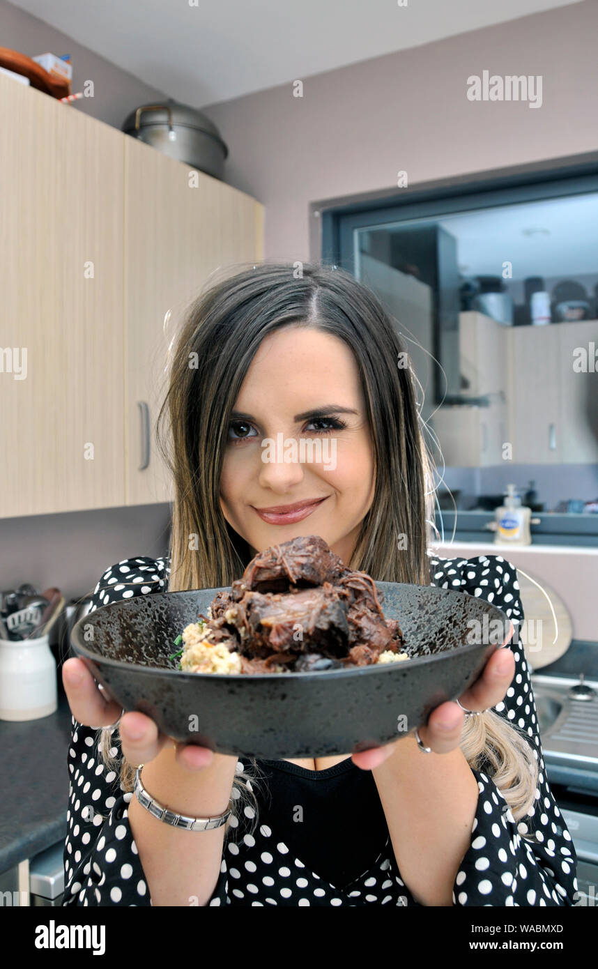 Woman kitchen eating curry hi-res stock photography and images - Alamy