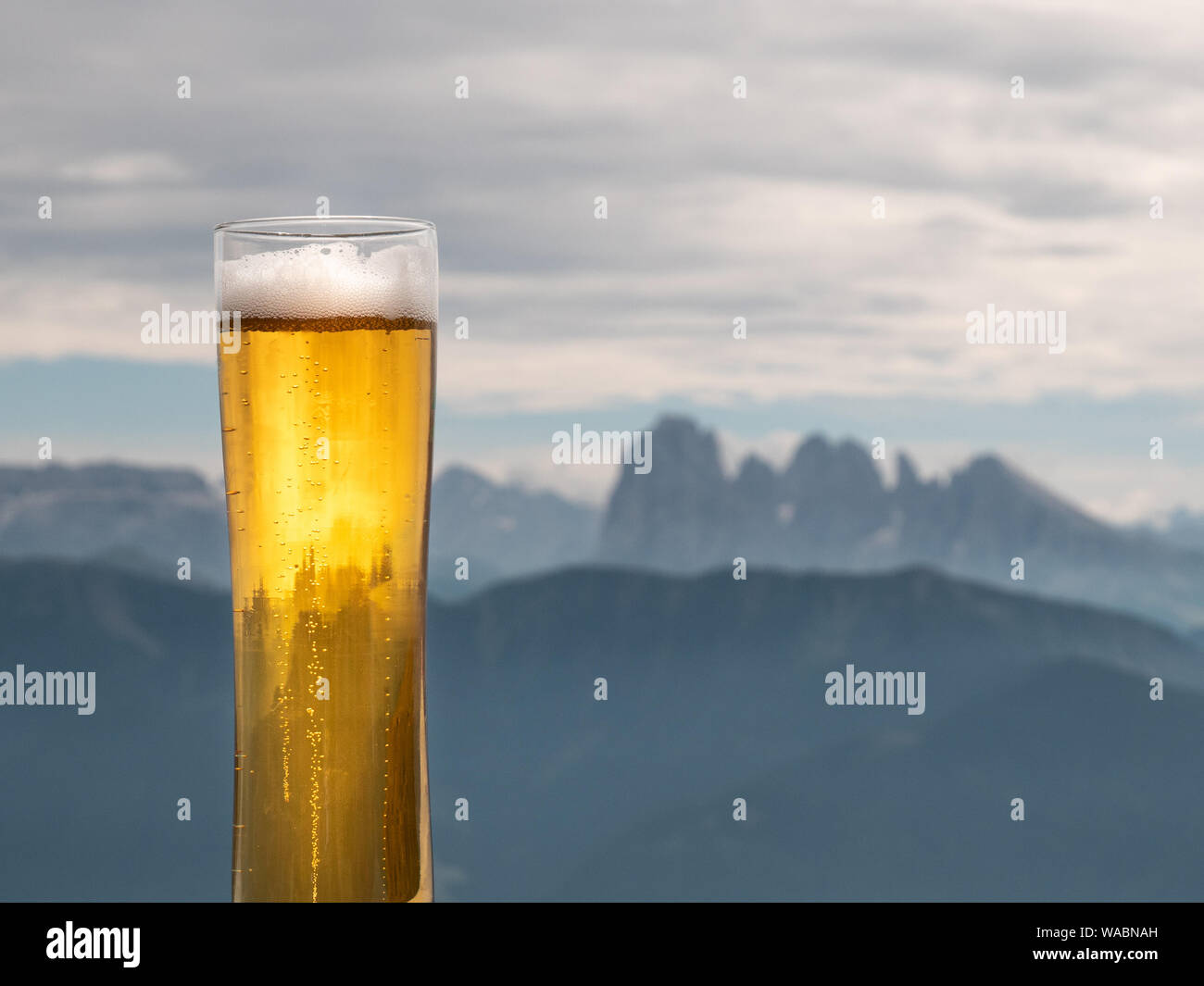 Beer in front of beautiful mountains Stock Photo - Alamy