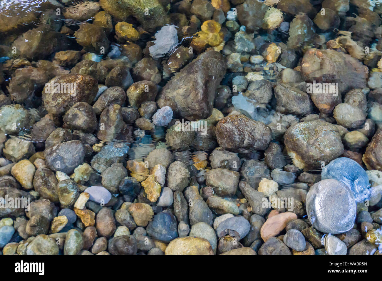 Round river rocks hi-res stock photography and images - Alamy
