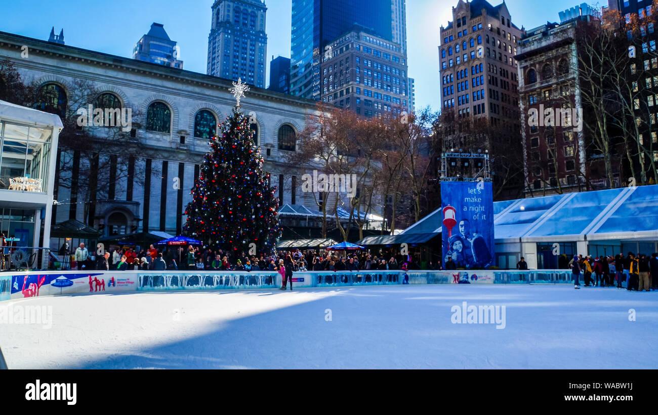 New York City, USA, December 27, 2014, People enjoying ice skating on ...