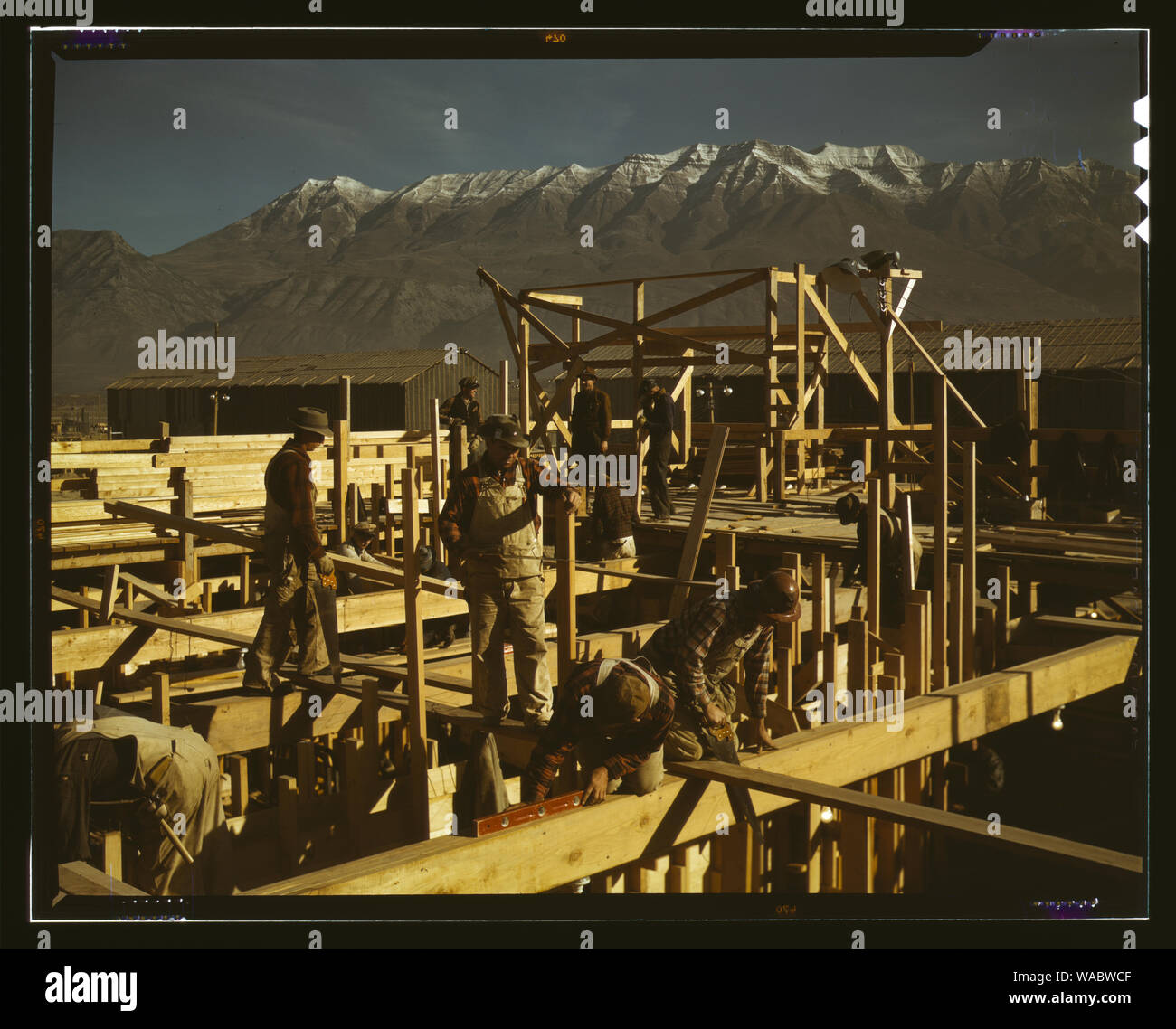 Constructing a building on the site of a new steel mill which will soon ...