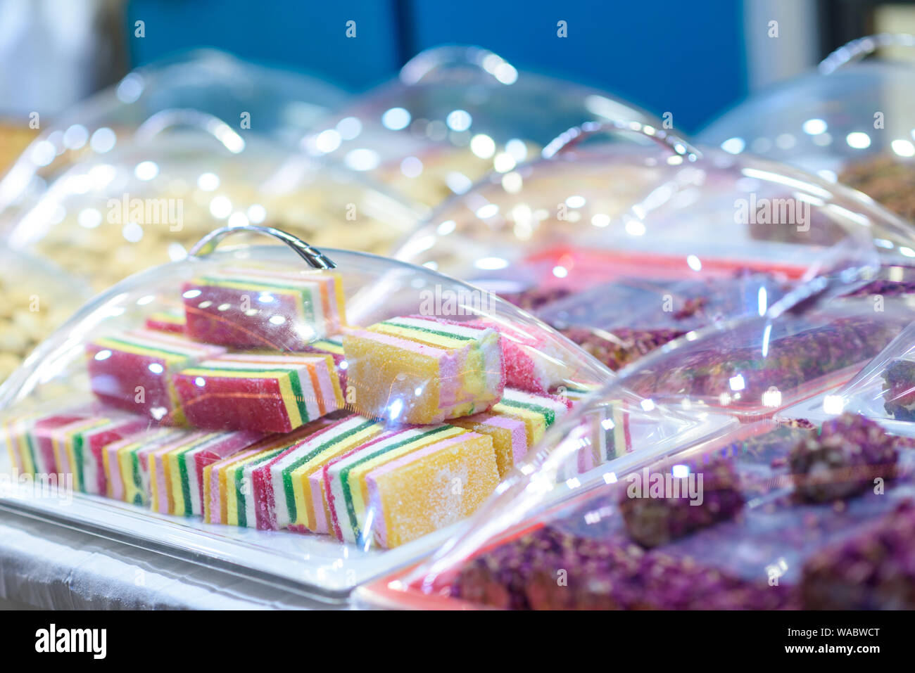 Traditional colorful sweet dessert close up at the famous market in Tel ...