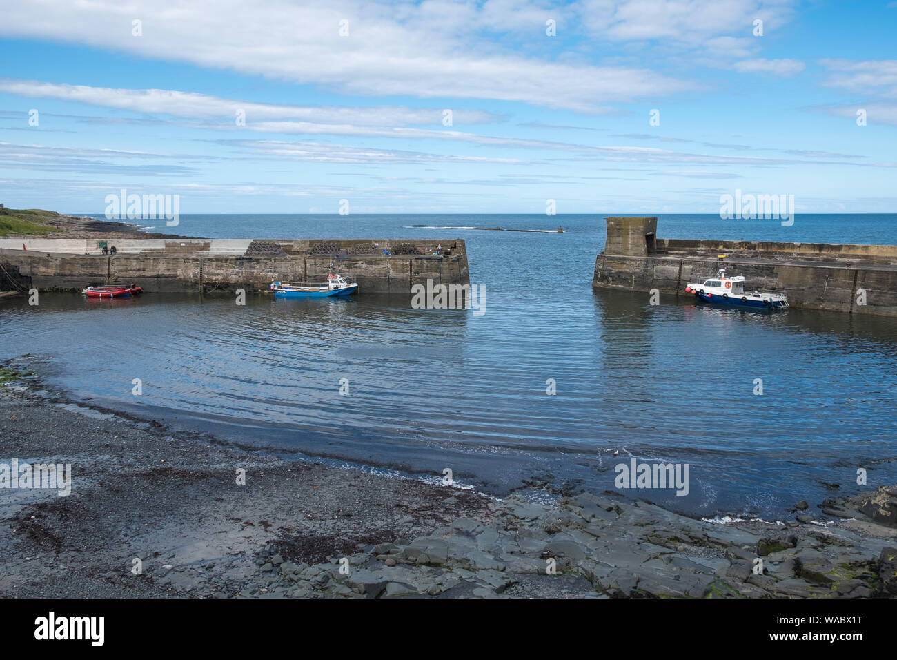 The harbour at Craster which is a small village on the Northumberland ...