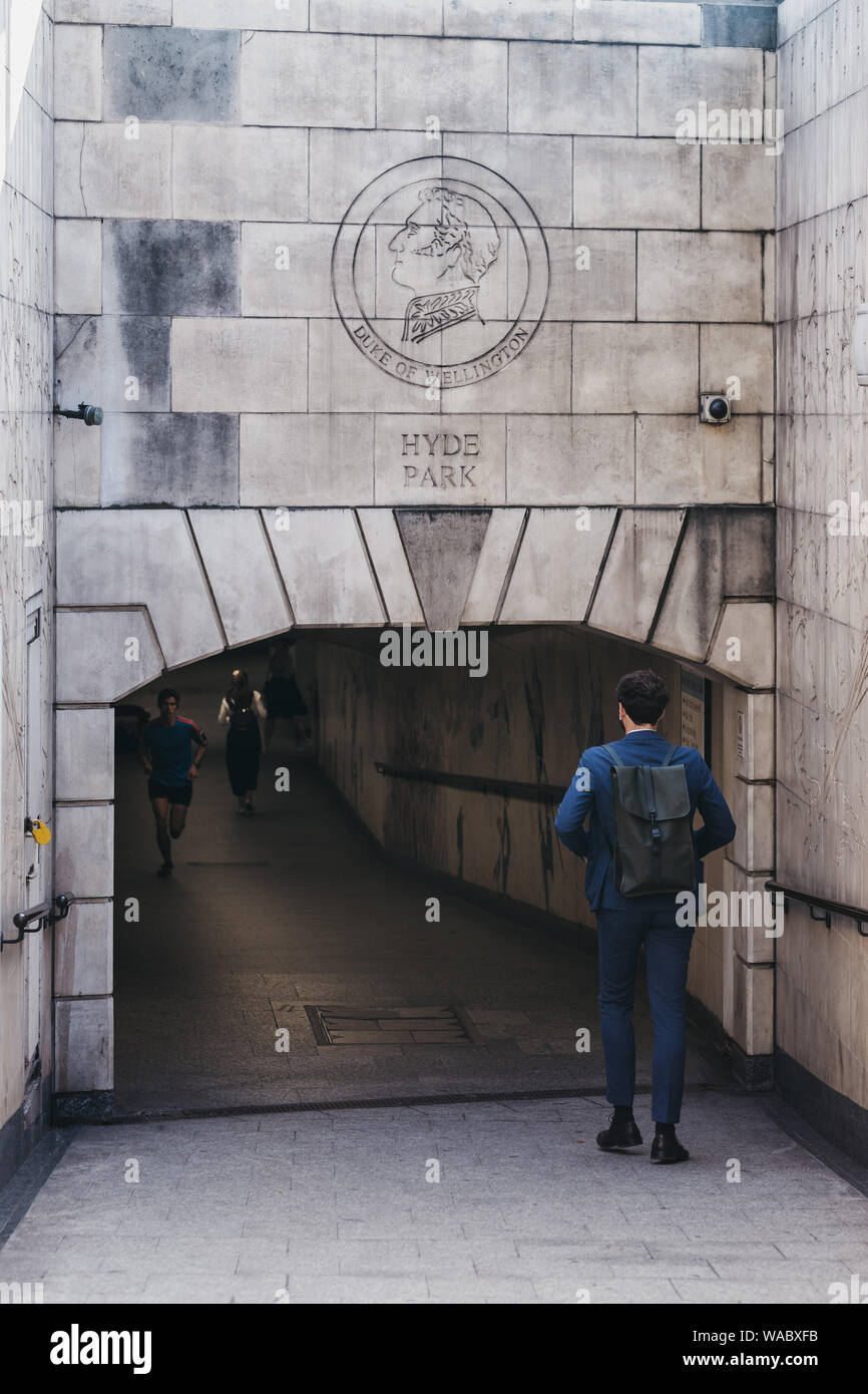 London, UK - July 15, 2019: Man dressed in a suit walking towards Duke ...