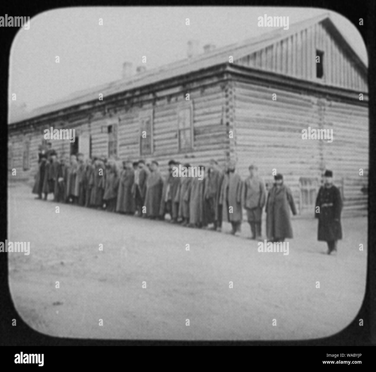 Convicts lined up outside dormitory at Khabarovsk Stock Photo - Alamy