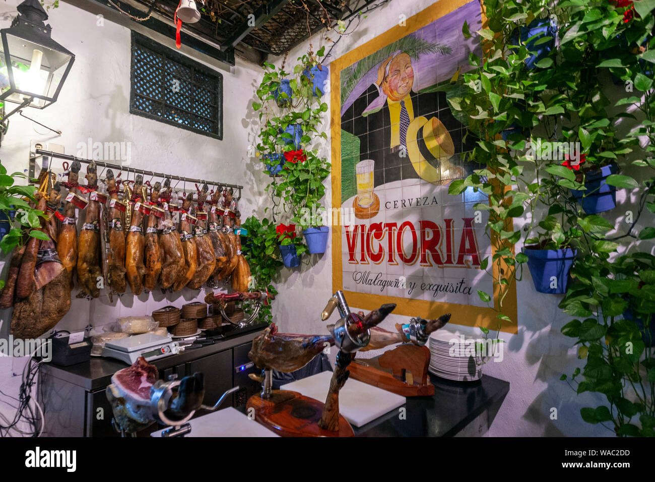 Serrano jamon and old victoria beer tile ads hi-res stock photography ...