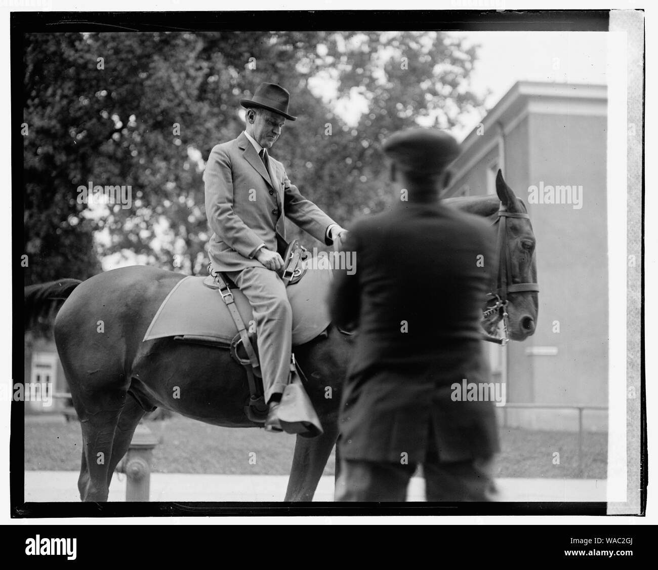 Coolidge on horseback, [8/18/23] Stock Photo - Alamy