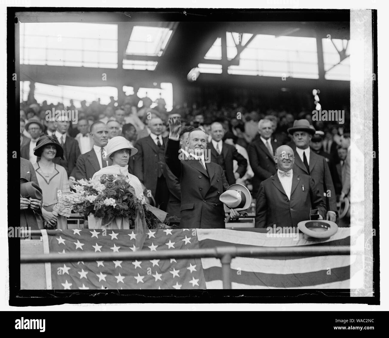 Coolidge throwing out ball at Police-Firemen's benefit ball game, 9/13 ...