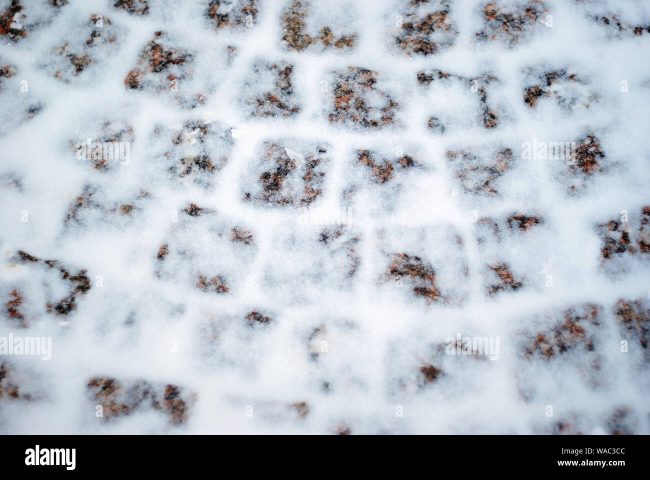 background, texture - snow-covered granite pavement tiles Stock Photo ...