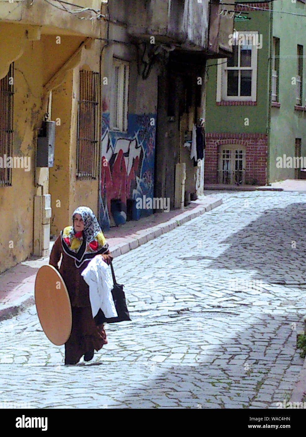Muslim woman carrying table hi-res stock photography and images - Alamy