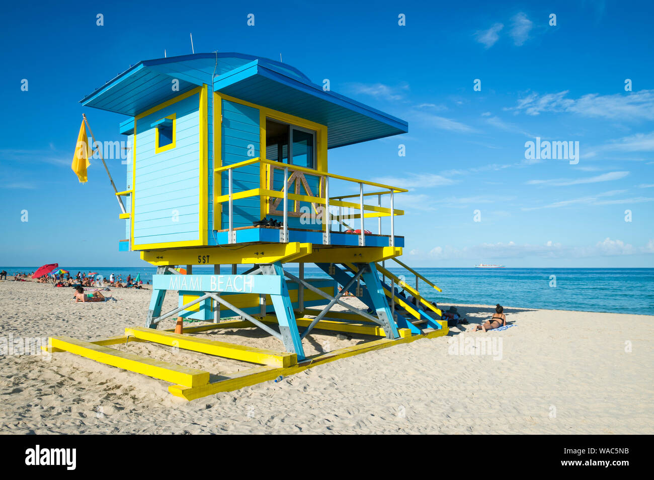 Bright scenic fine weather view of brightly painted lifeguard tower ...