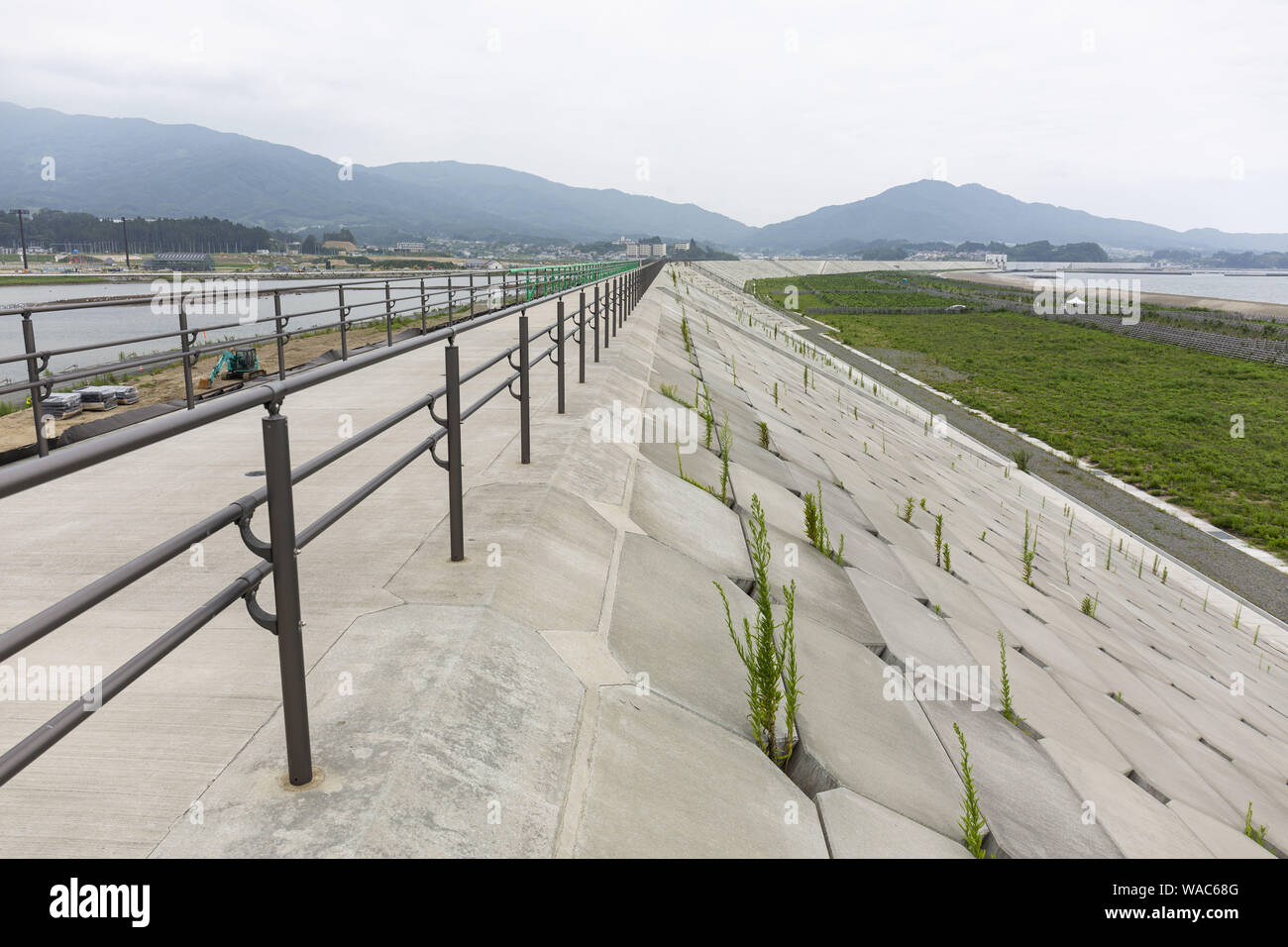 Rikuzentakata, Japan. 19th Aug, 2019. A huge sea wall built along the ...