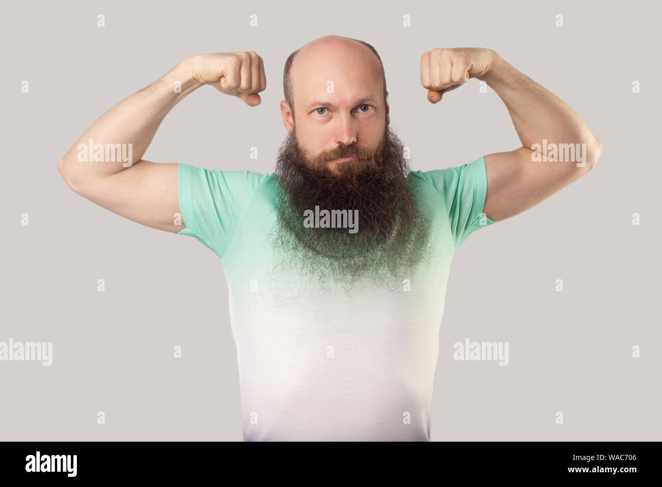 I am strong and independent. Portrait of serious middle aged bald ...