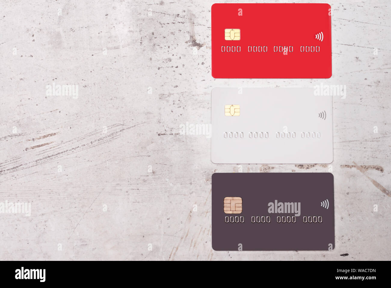 Three bank cards on a light background Stock Photo - Alamy
