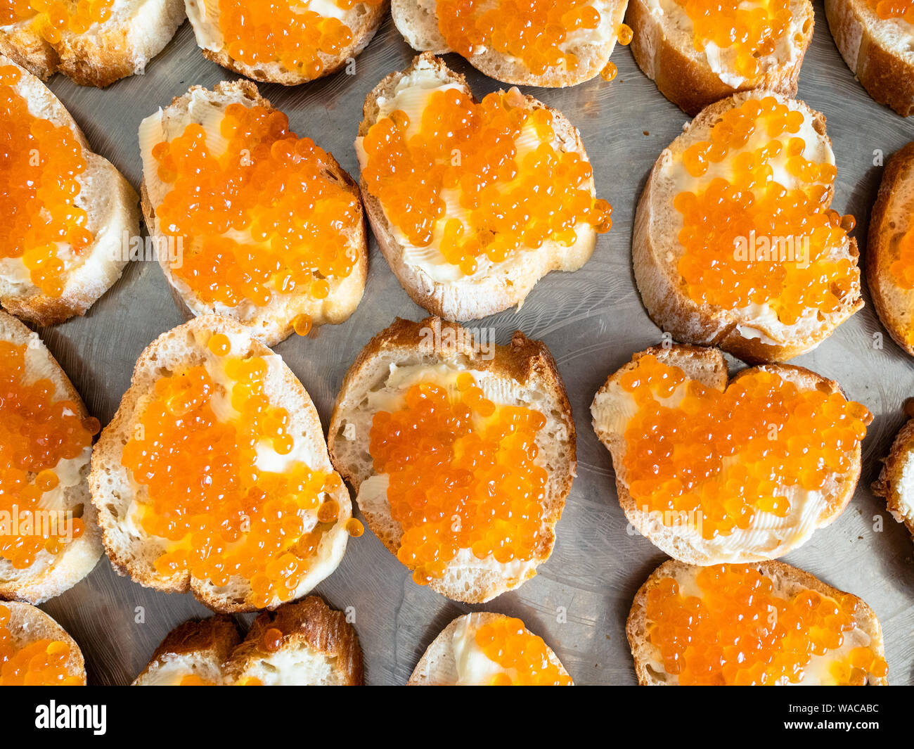 food background - many butterbrots with red caviar on tray Stock Photo ...