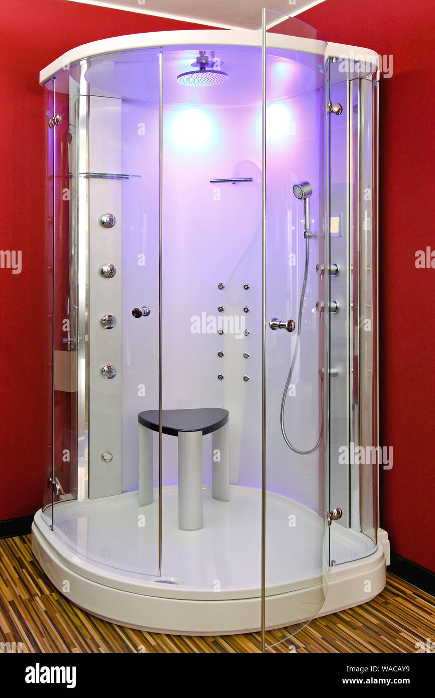 Big Shower Cabin in Corner of Red Bathroom Stock Photo - Alamy