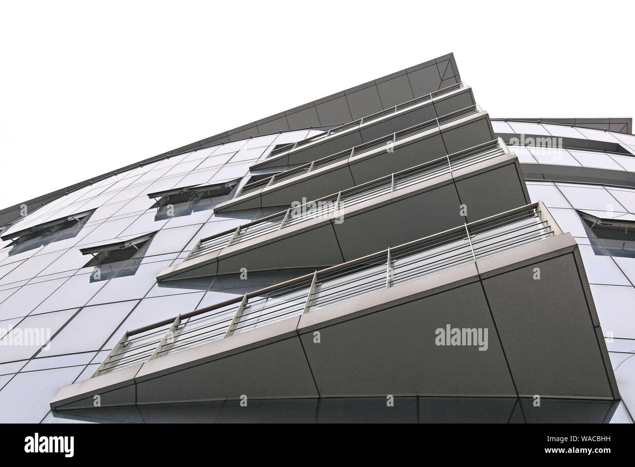 Triangular Terrace Balcony at Modern Glass Building Stock Photo - Alamy