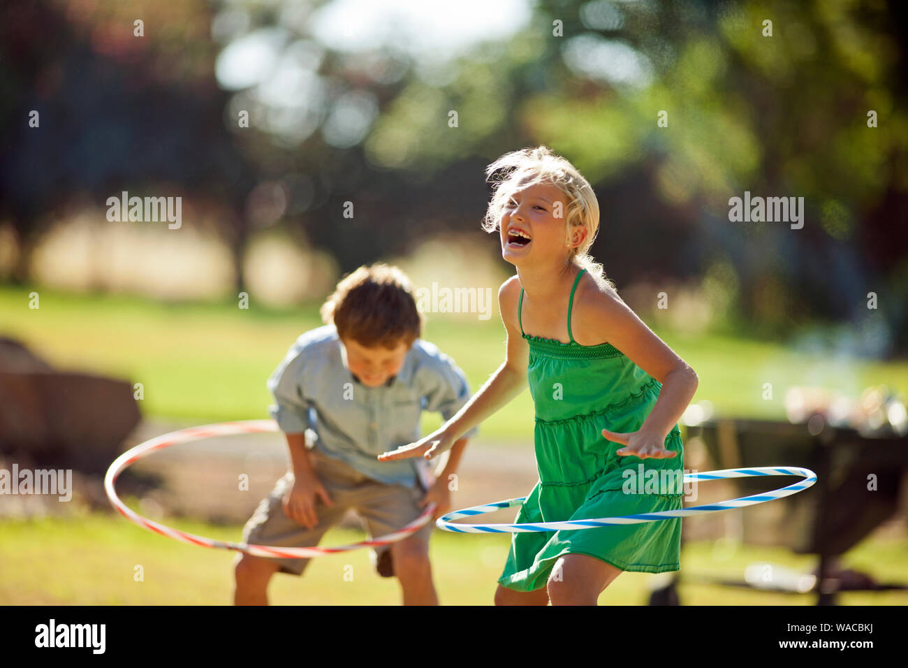 Children playing hula hoops hi-res stock photography and images - Alamy