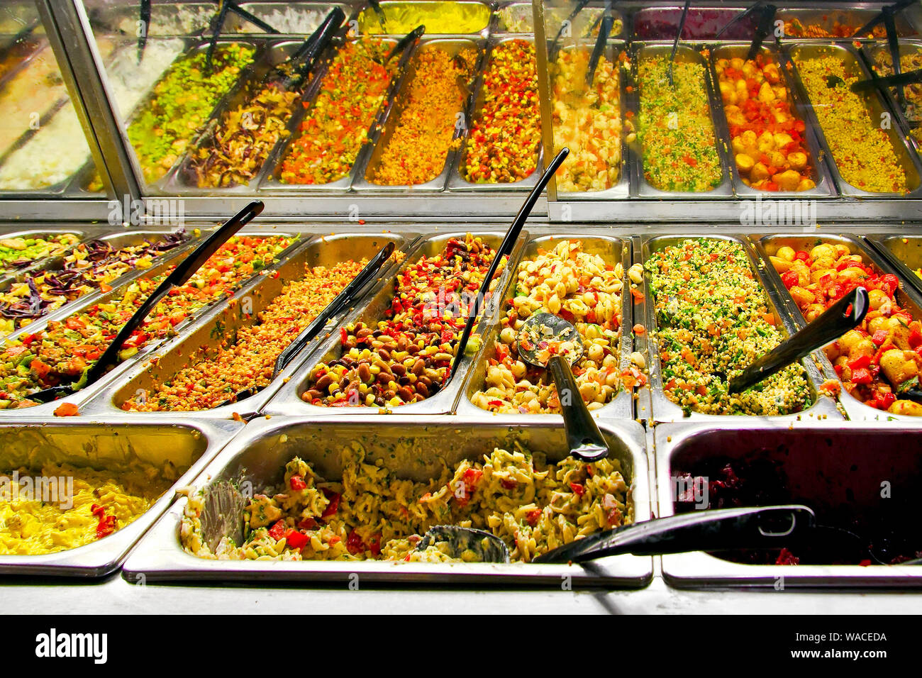 Big display in supermarket with prepared food Stock Photo - Alamy