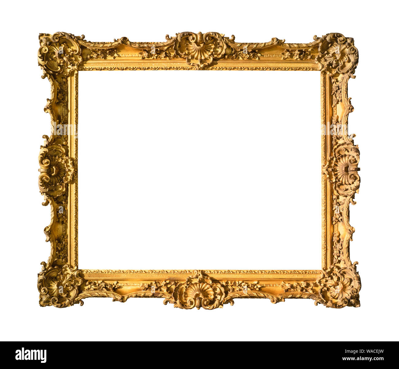 ancient wide ornamental baroque painting frame painted in gold color ...