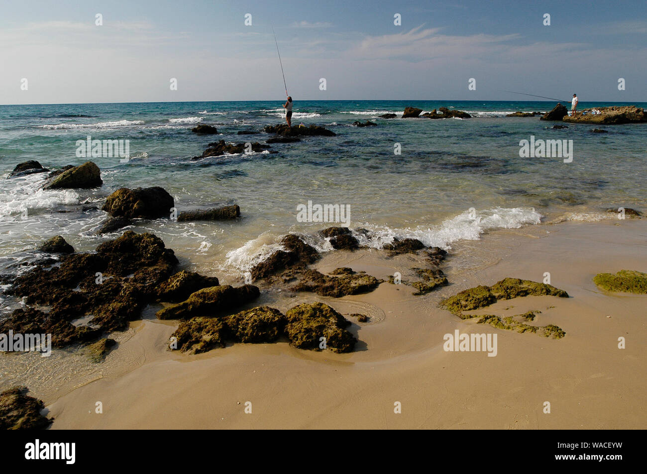 fishemen on the beach, Israel Stock Photo - Alamy