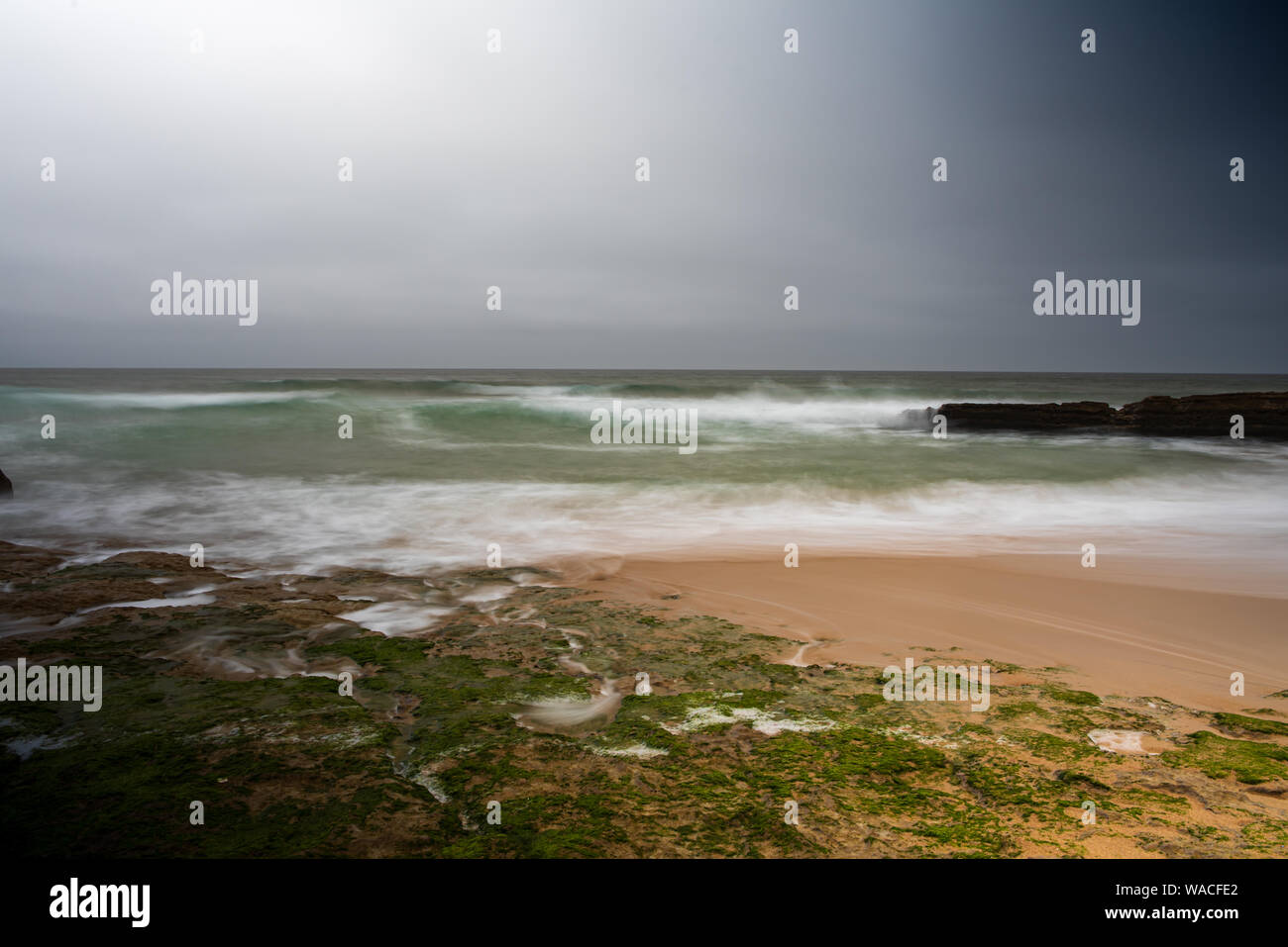 Ocean waves breaking in a beach Stock Photo - Alamy