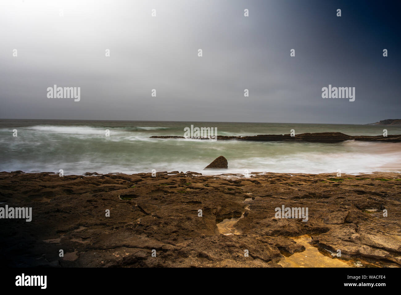 Ocean waves breaking in a beach Stock Photo - Alamy