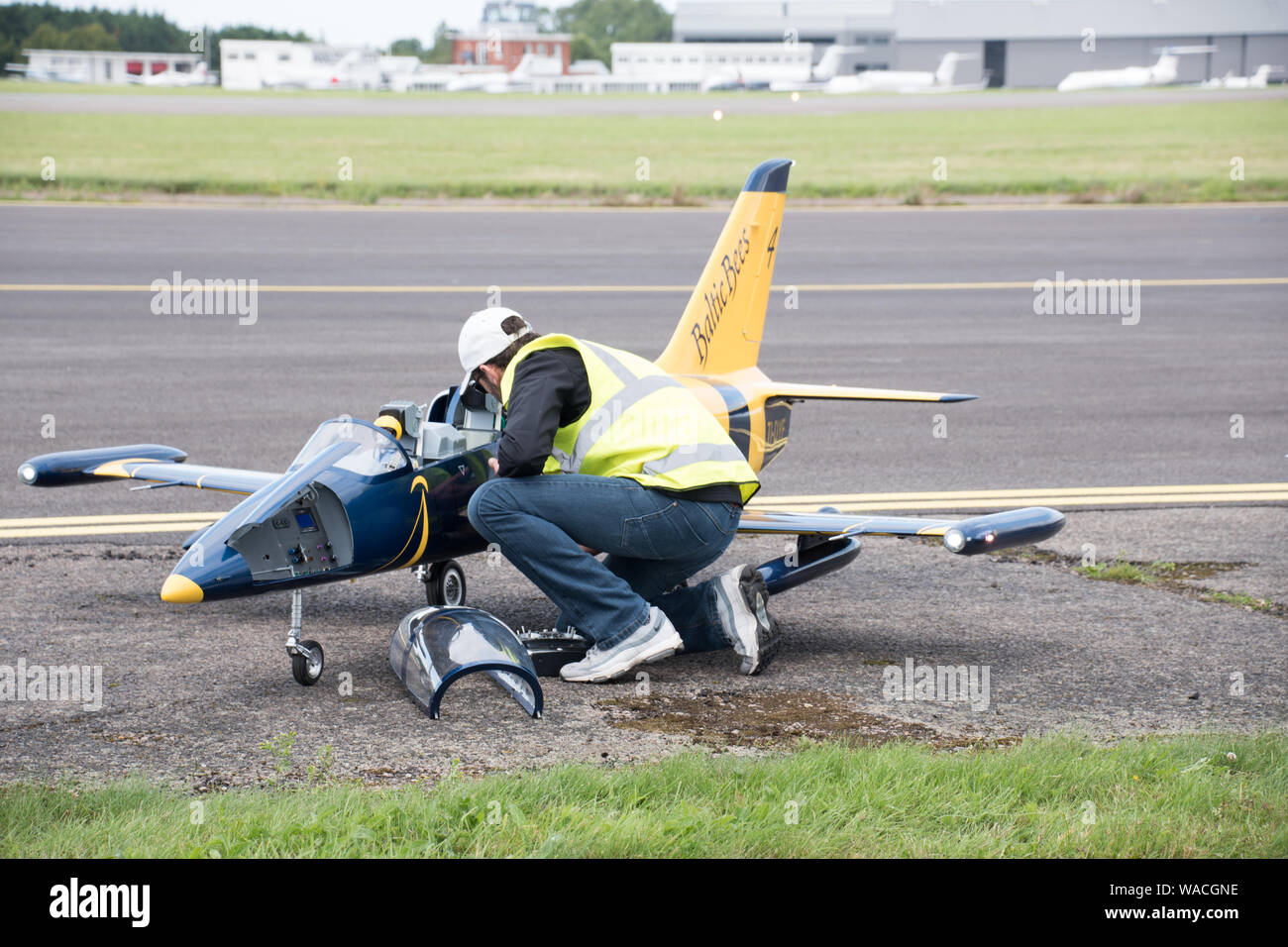 A technician checking a radio controlled Baltic Bees aircraft at ...