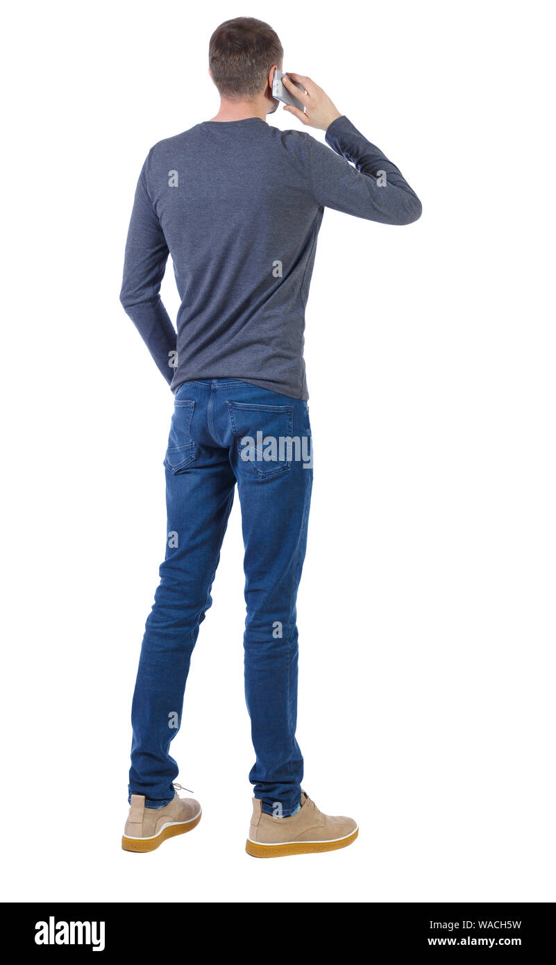 back view of a man talking on the phone. backside view of person. Rear ...