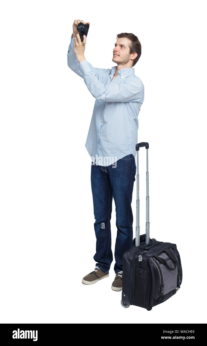 Back view of business man with suitcase with camera. Standing young guy ...