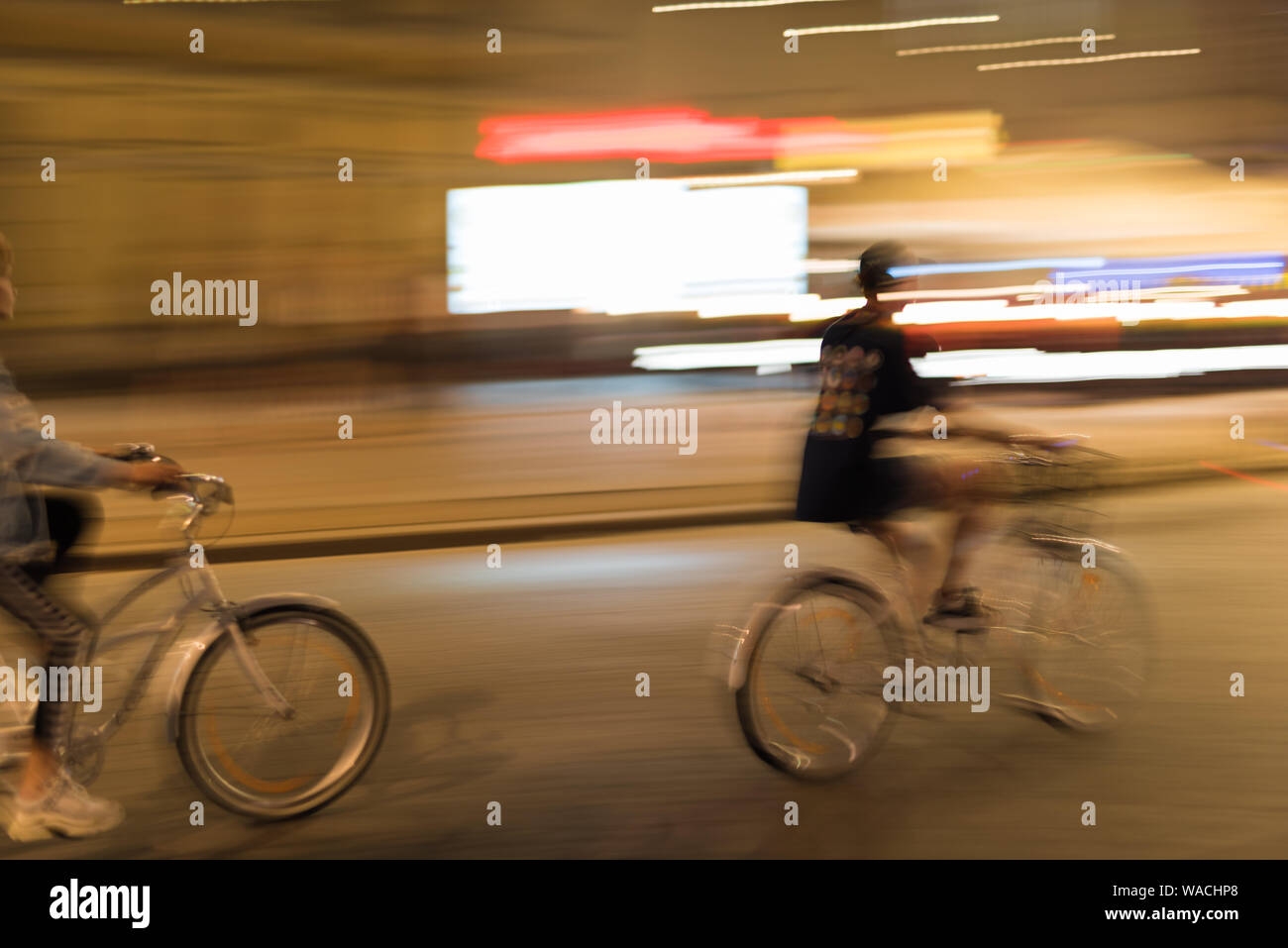 Riding bicycle at night hi-res stock photography and images - Alamy