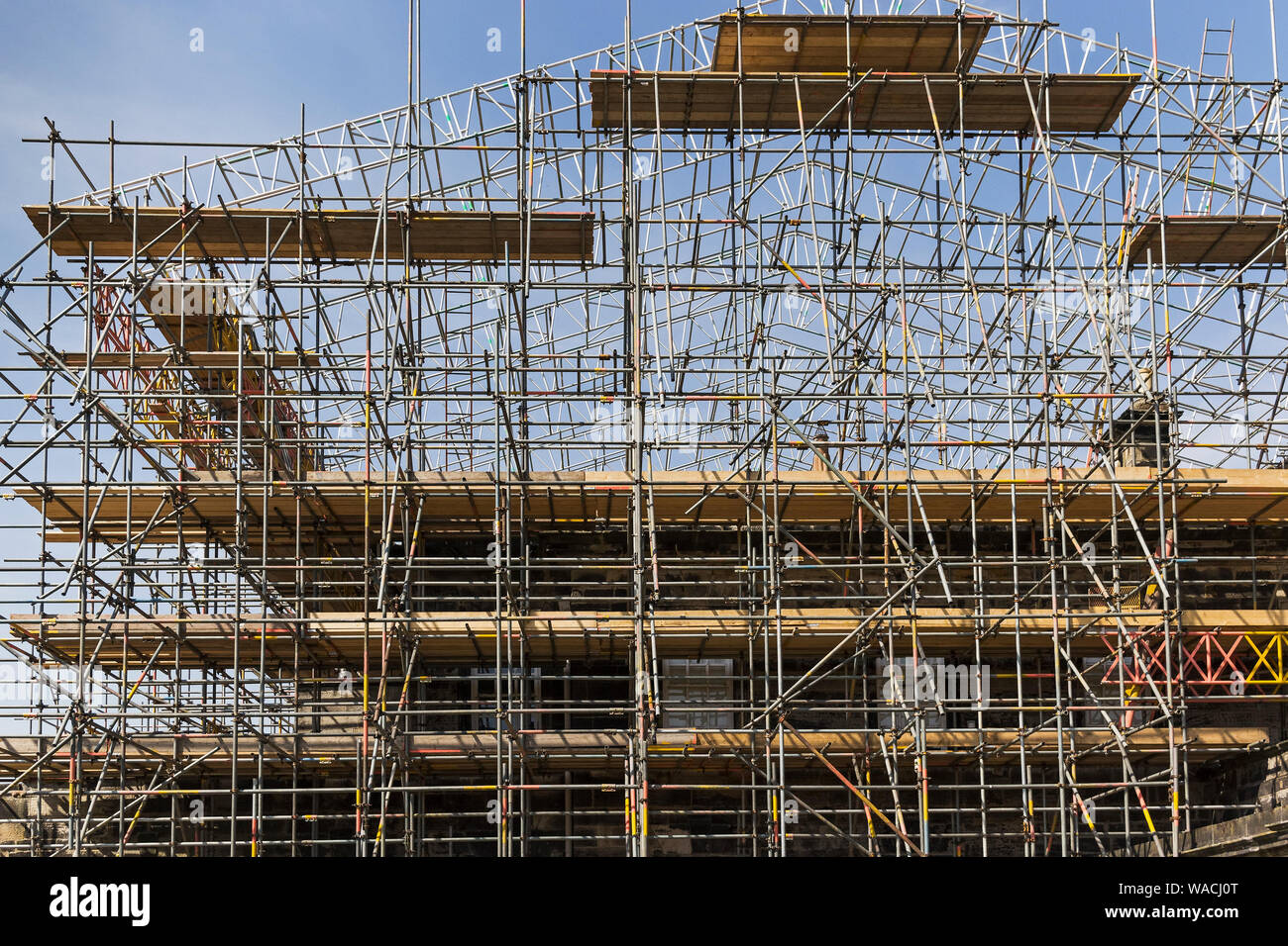 Scaffolding and walkways on a renovation project Stock Photo - Alamy