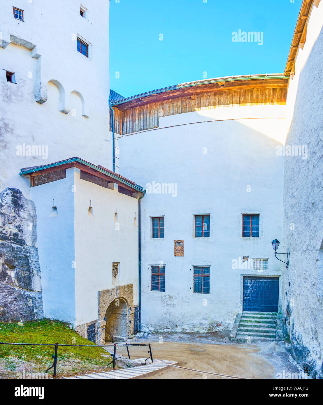 The curved road after the entering the Mayor's Gates and high walls are ...