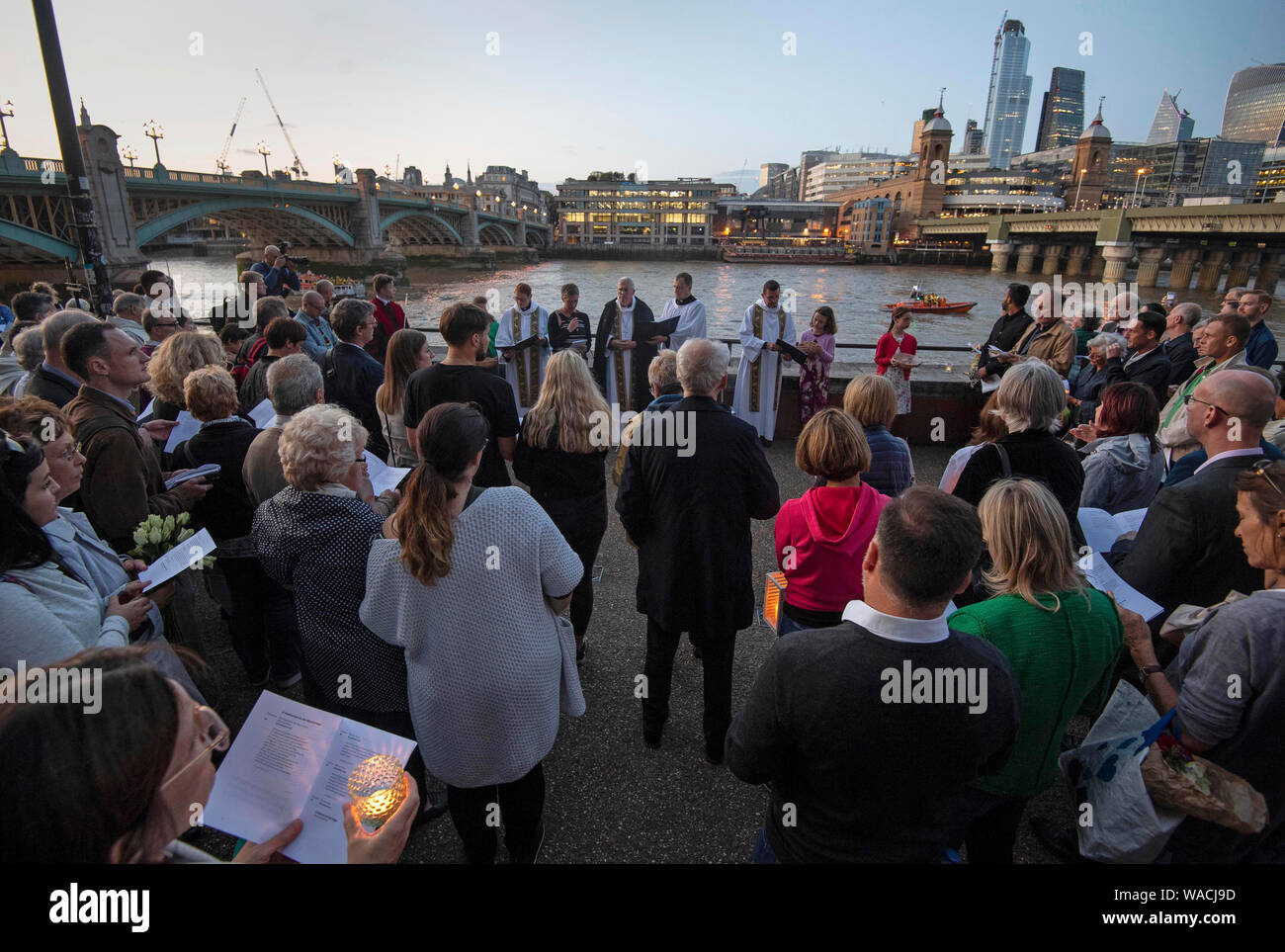 The Bishop of Southwark holds a short service on the bank of the River ...