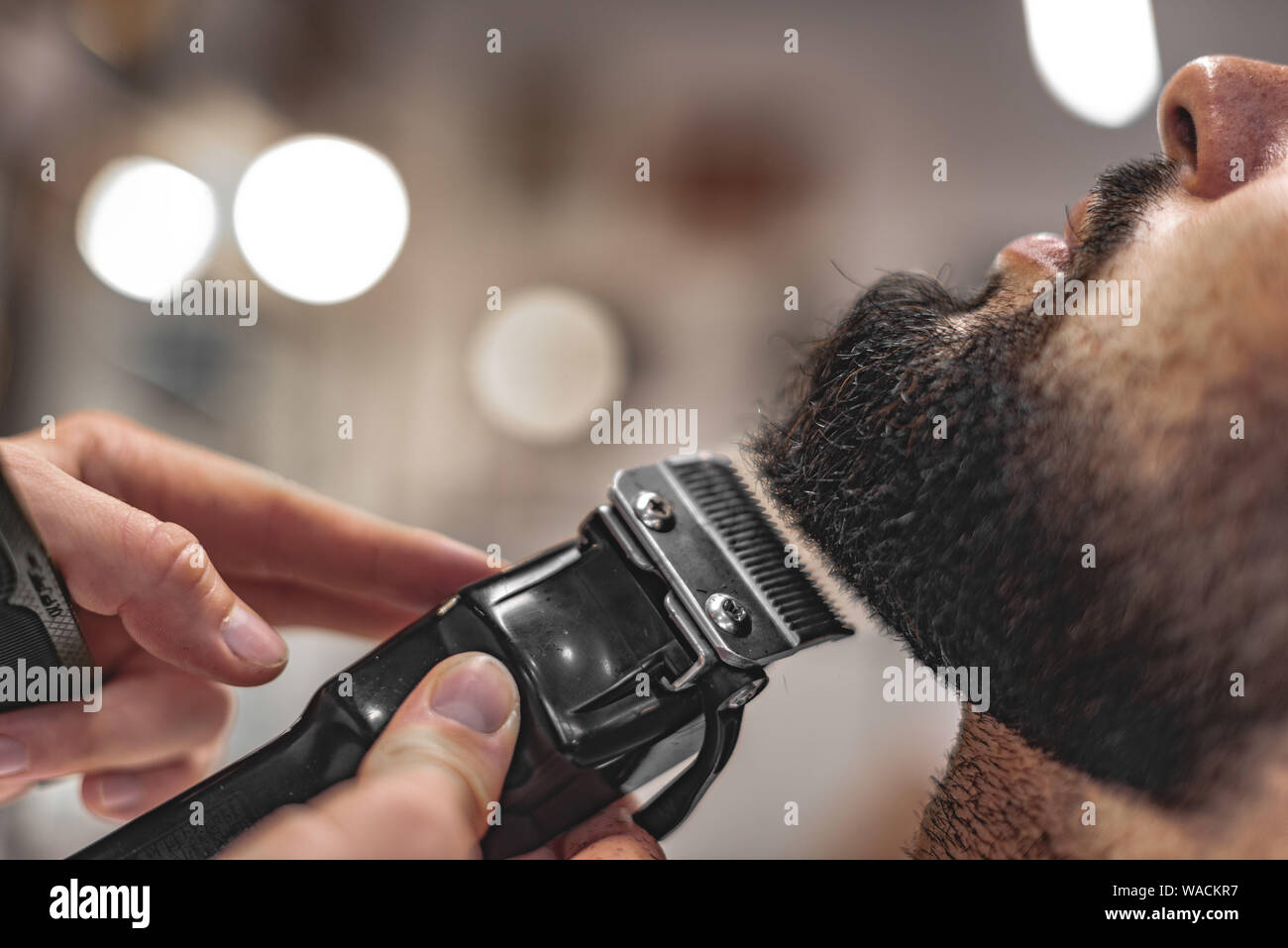 barber shop beard haircut. beard care Stock Photo - Alamy