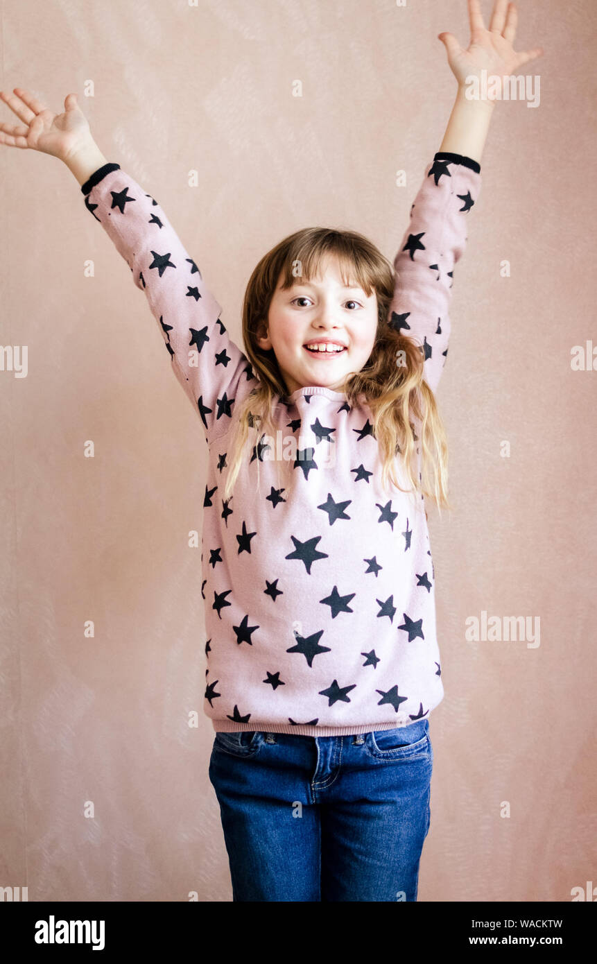 Little girl with long dark blonde hair and wonderful expressive brown ...