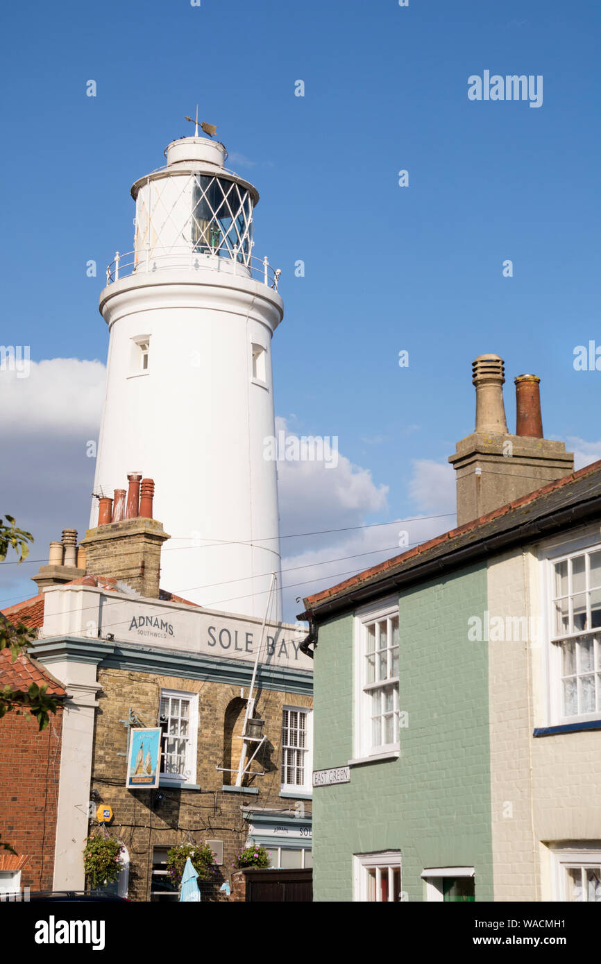 Southwold Lighthouse standing above historic town buildings, Southwold ...