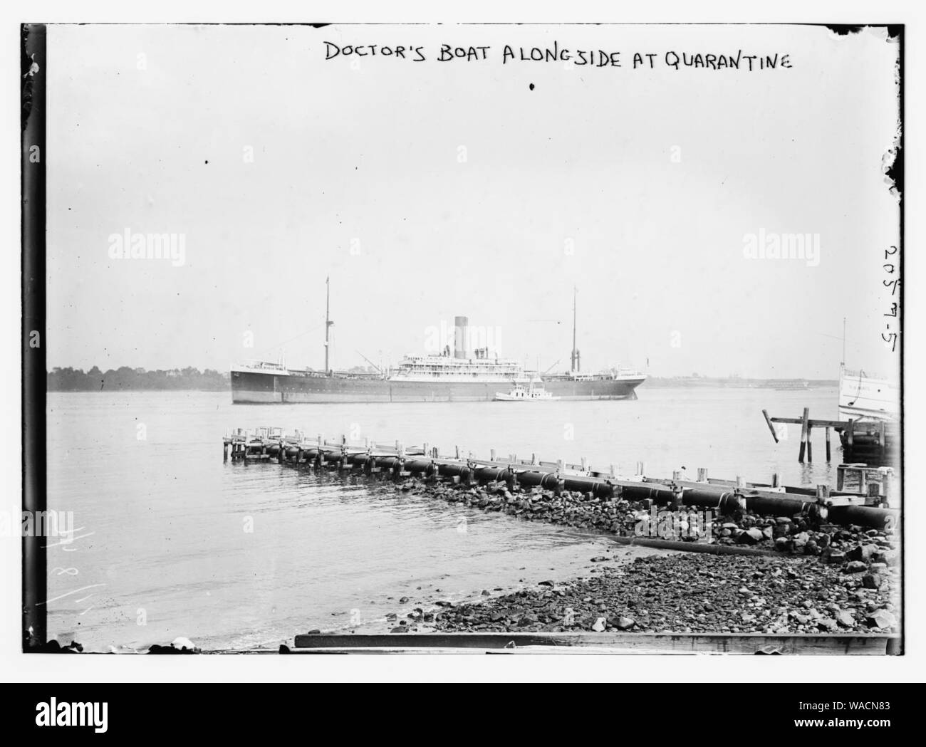 Doctor's boat alongside at quarantine Stock Photo - Alamy