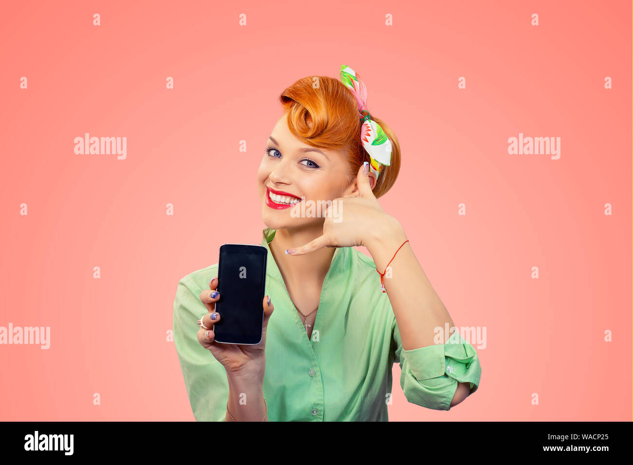 Call me. Closeup redhead young woman pretty smiling pinup girl green ...