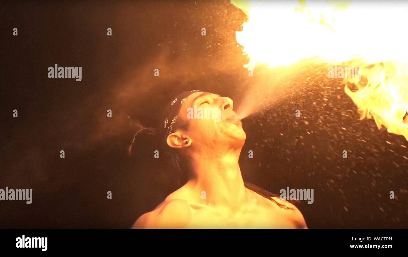 THE CIRCUS: DOWN THE ROAD, a fire act at the Carson & Barnes Circus ...