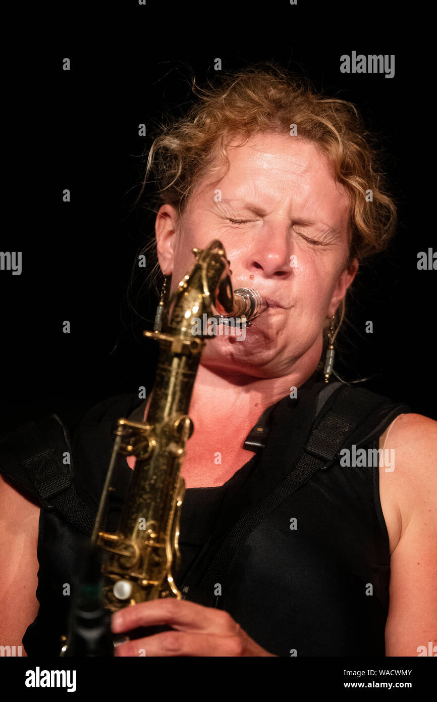 Female baritone sax player hi-res stock photography and images - Alamy