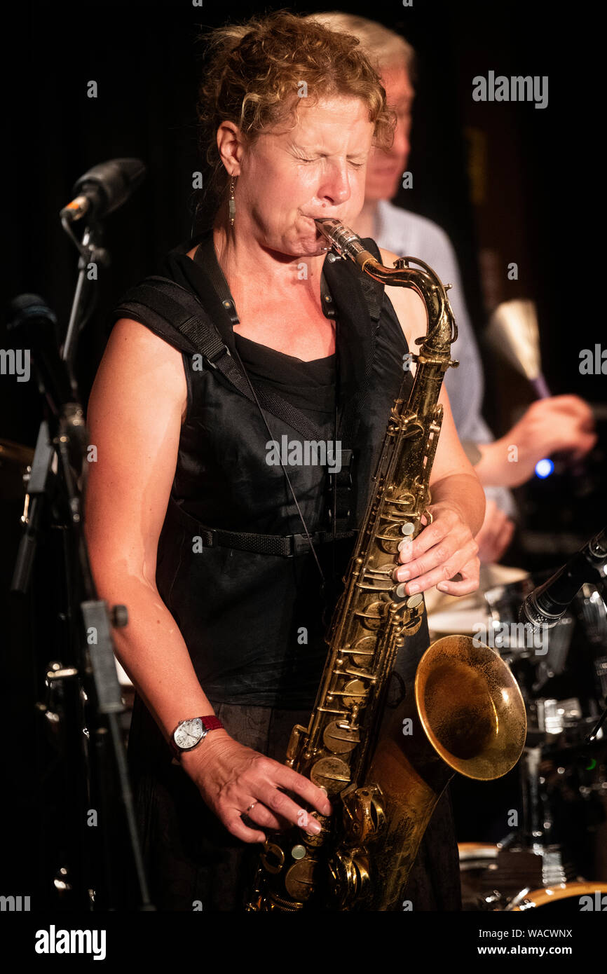 Female baritone saxophone player hi-res stock photography and images ...