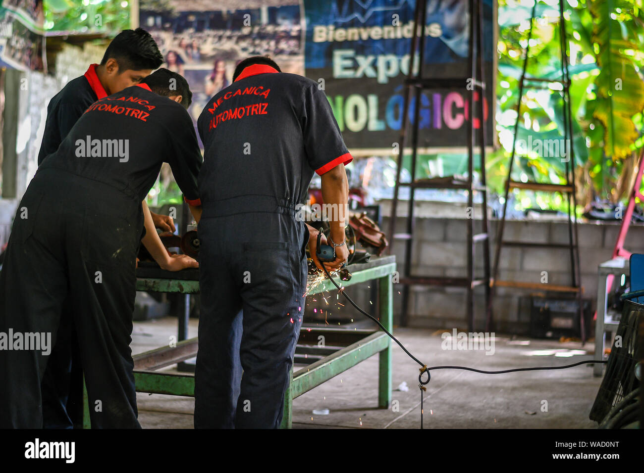 latin mechanic students working on project at college in Guatemala ...